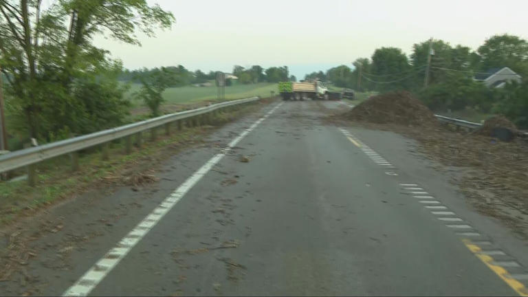 Flooding, debris closes busy road after heavy rain in Clark Co.