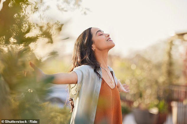 The secret to happiness: Study pinpoints five key traits linked to ...