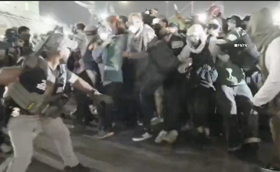 Another night of clashes between protesters and ICE agents outside ...