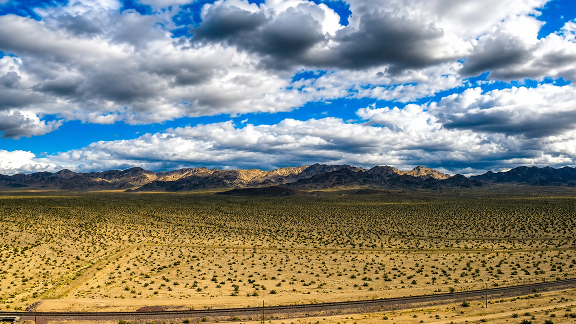 The desert looked endless until the storm clouds arrived