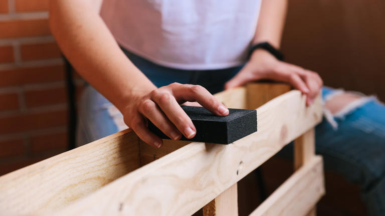DIY scrap wood pallets into an affordable storage solution for your ...