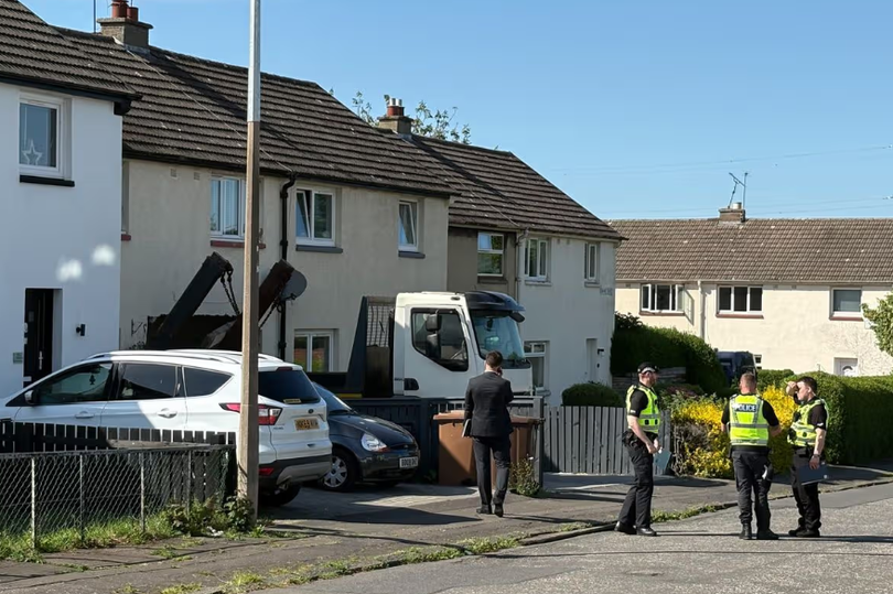 Car 'rammed' into Edinburgh home and set ablaze in 'fresh gang war attack'