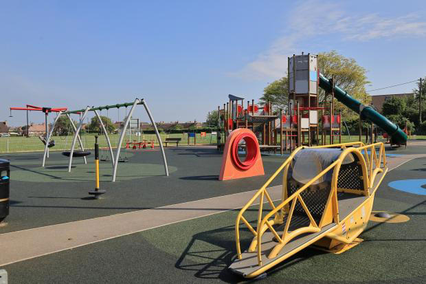 Grown-ups break equipment playing at children's park