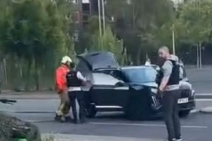 Three arrested after armed police race to Salford street and car ...
