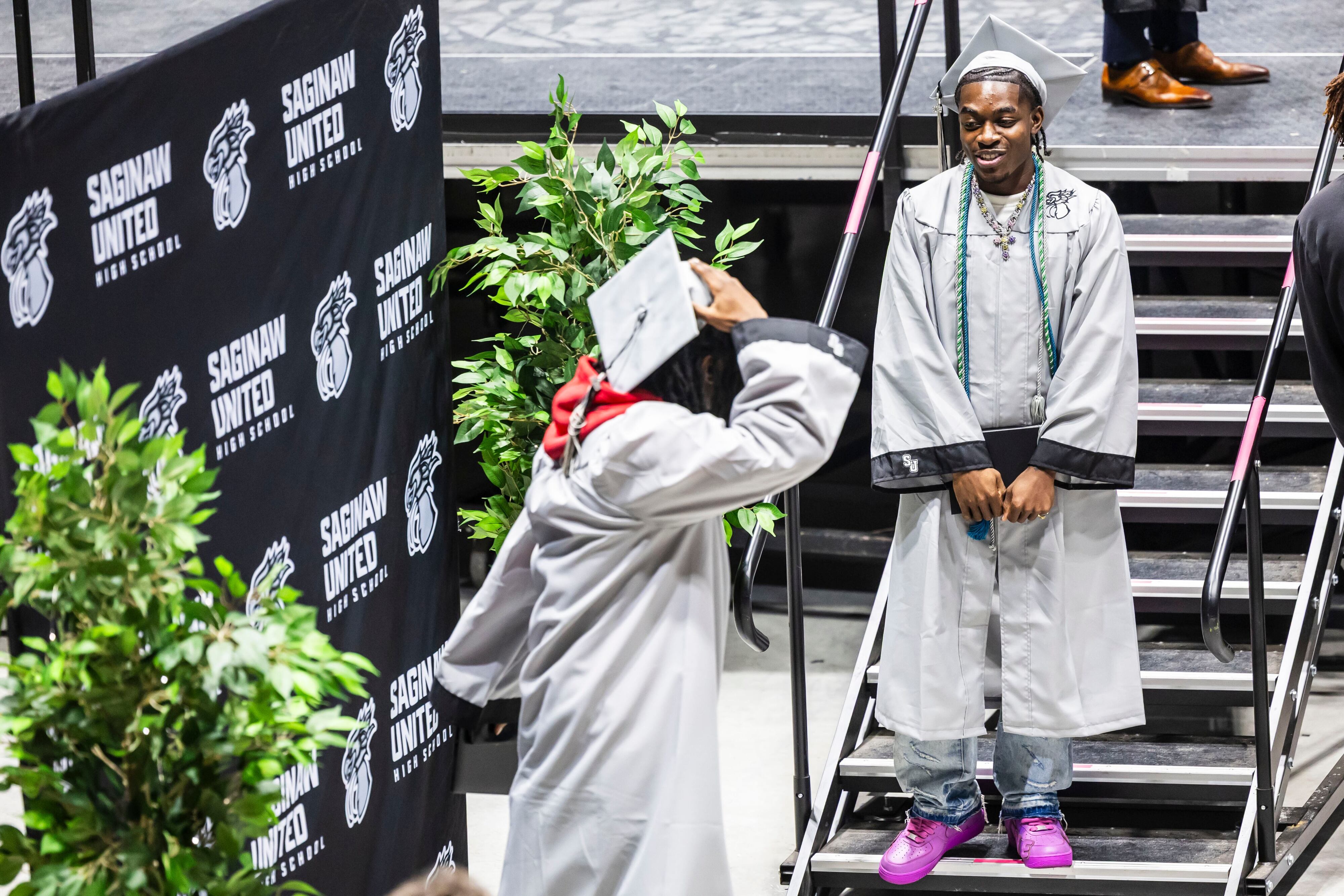 Mother accepts slain son’s diploma at Saginaw graduation