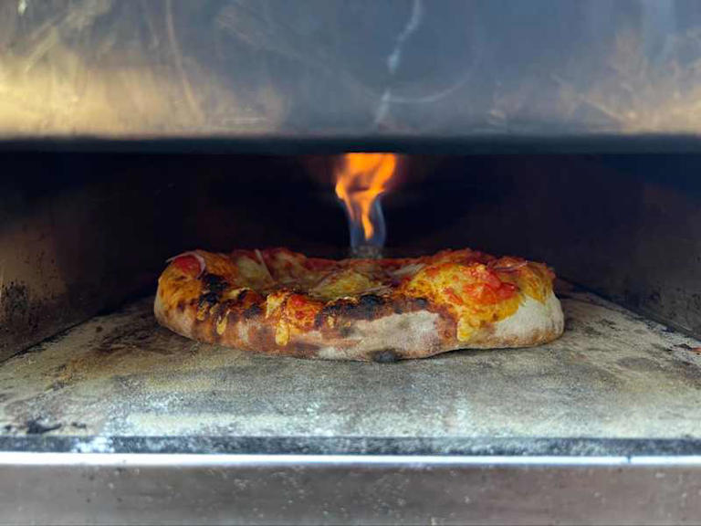 I'm a former pizza chef, and this is the one backyard oven I've used ...