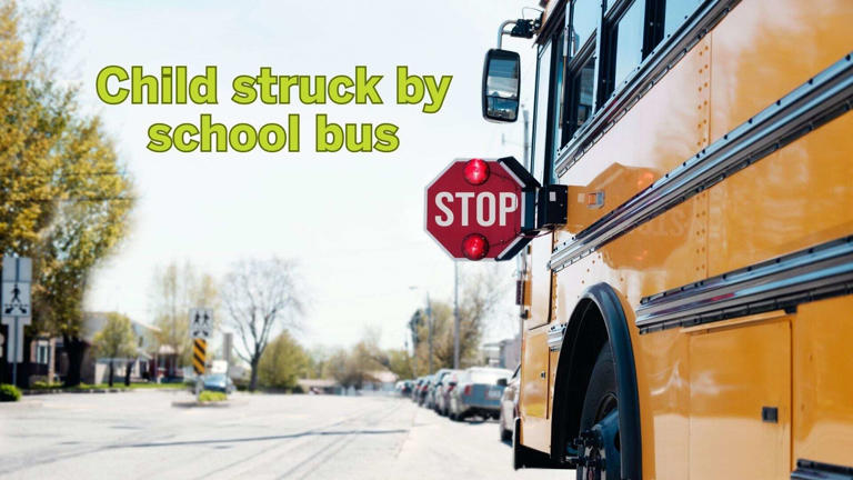 Child injured after being hit by school bus, cops say