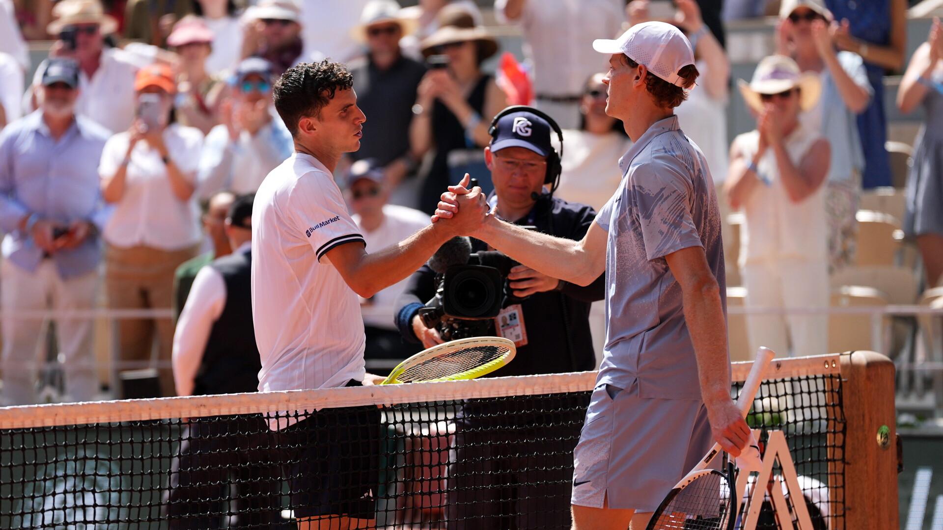 Top-ranked Jannik Sinner loses in the French Open second round
