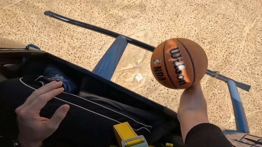 Watch what happens when they attempt a 900-foot basketball shot from a ...