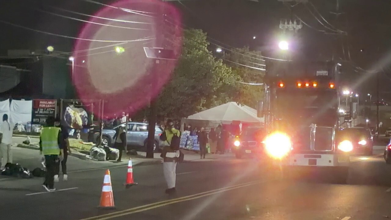 Anti-ICE agitators seen directing traffic outside Delaney Hall ...
