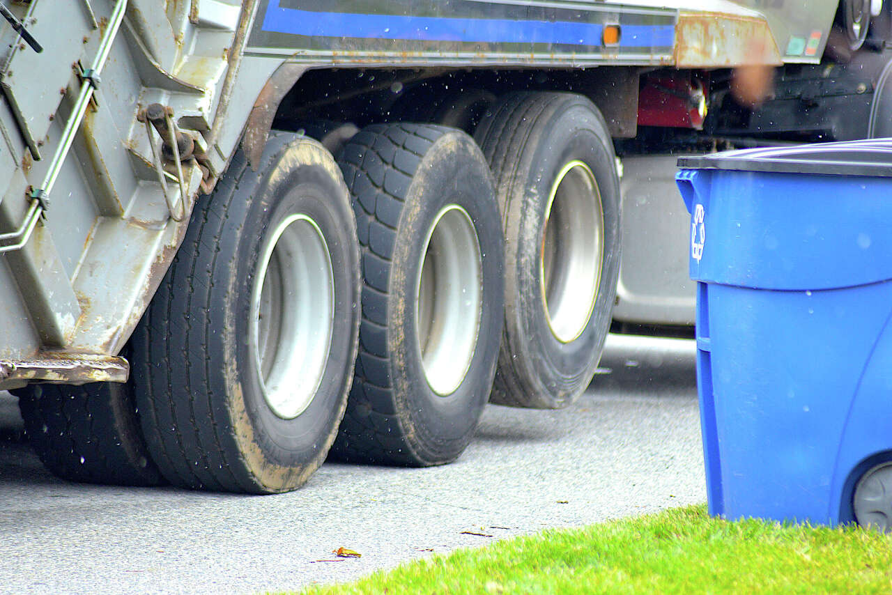 Alton refunds $8,328 in garbage overpayments to residents, group