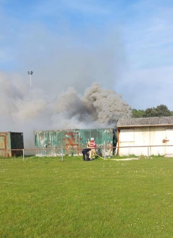 Boy, 13, arrested after child trapped in burning container in tiny UK ...