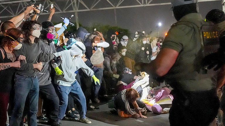 Watch: Police absent from Delaney Hall chaos as agitators block ICE ...