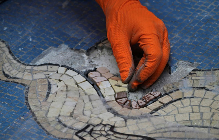 Milan restores bull mosaic's testicles to former glory