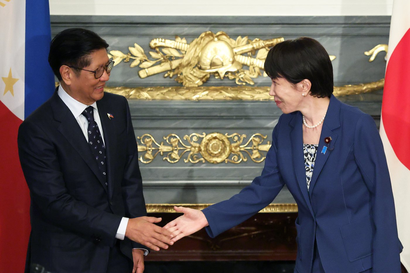 Japan woos Philippine leader during state visit with arms sales and ...