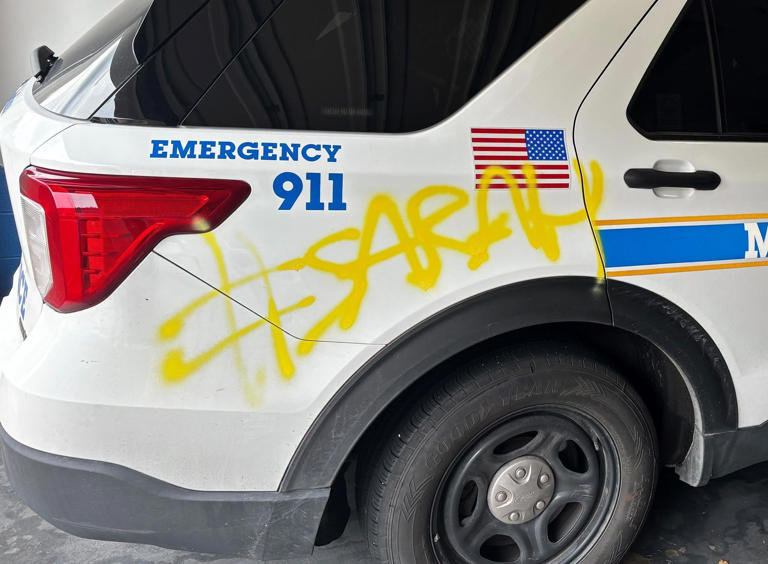 Who is Sarah and why did someone tag her name on a Nashville Police SUV?