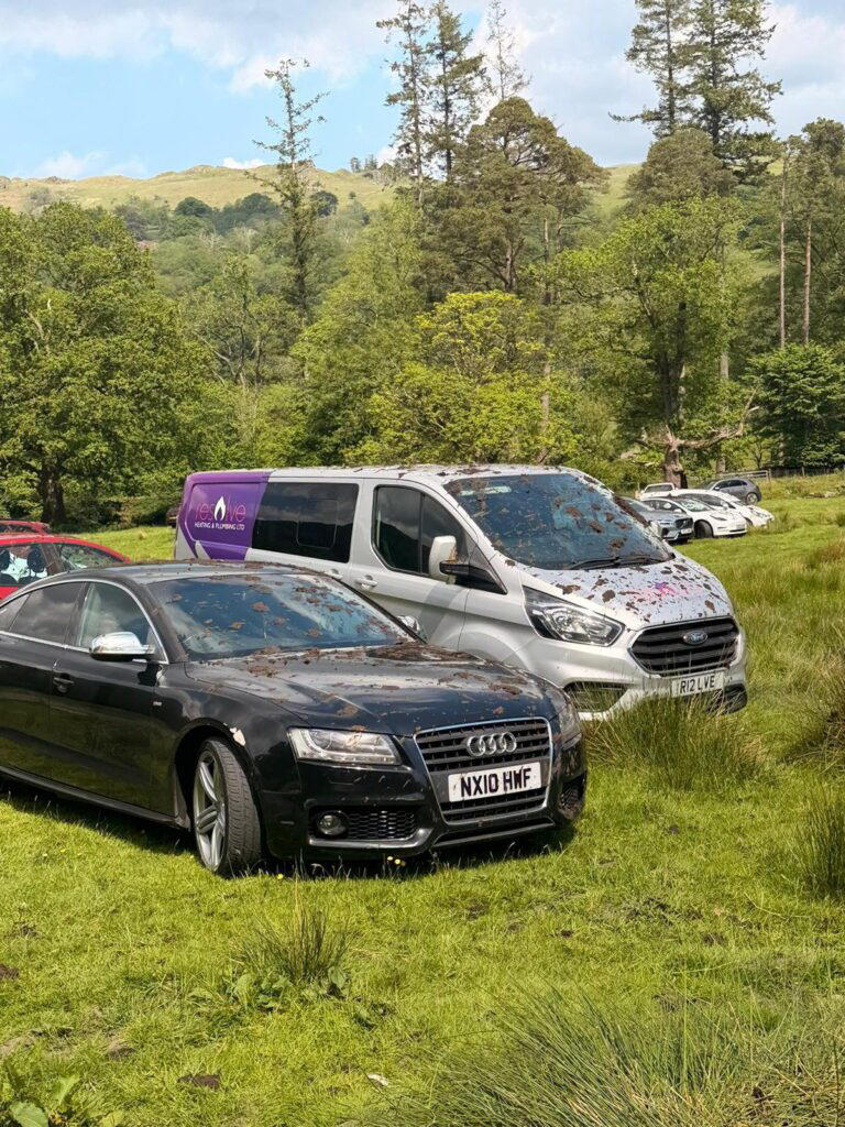 Farmer sprays slurry on cars parked illegally in Lake District field