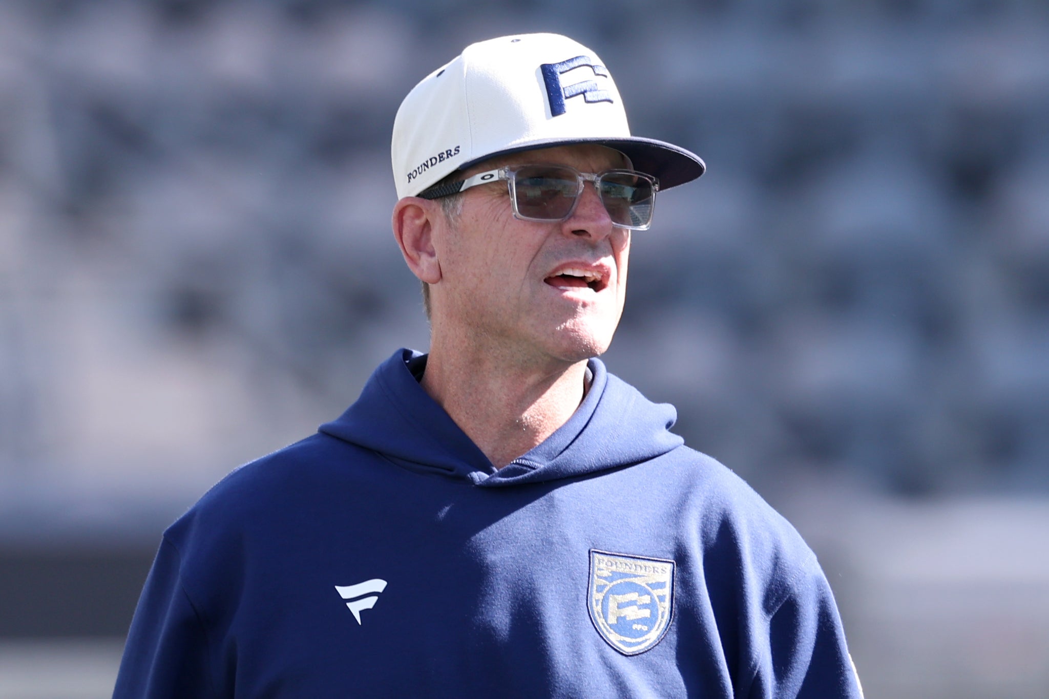 Chargers coach reacts to QB missing workouts to be with Madison Beer