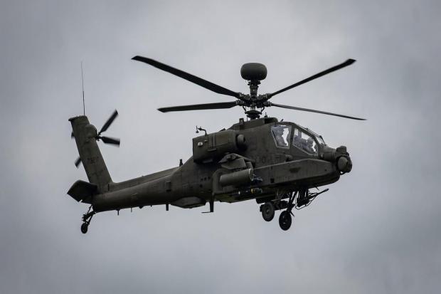Military Apache helicopter seen soaring over Southampton
