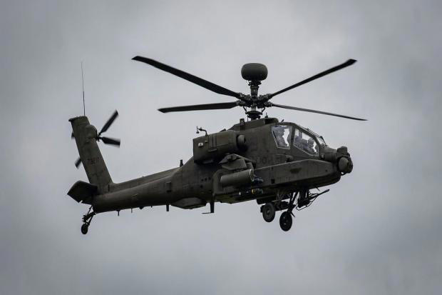Military Apache helicopter seen soaring over Southampton