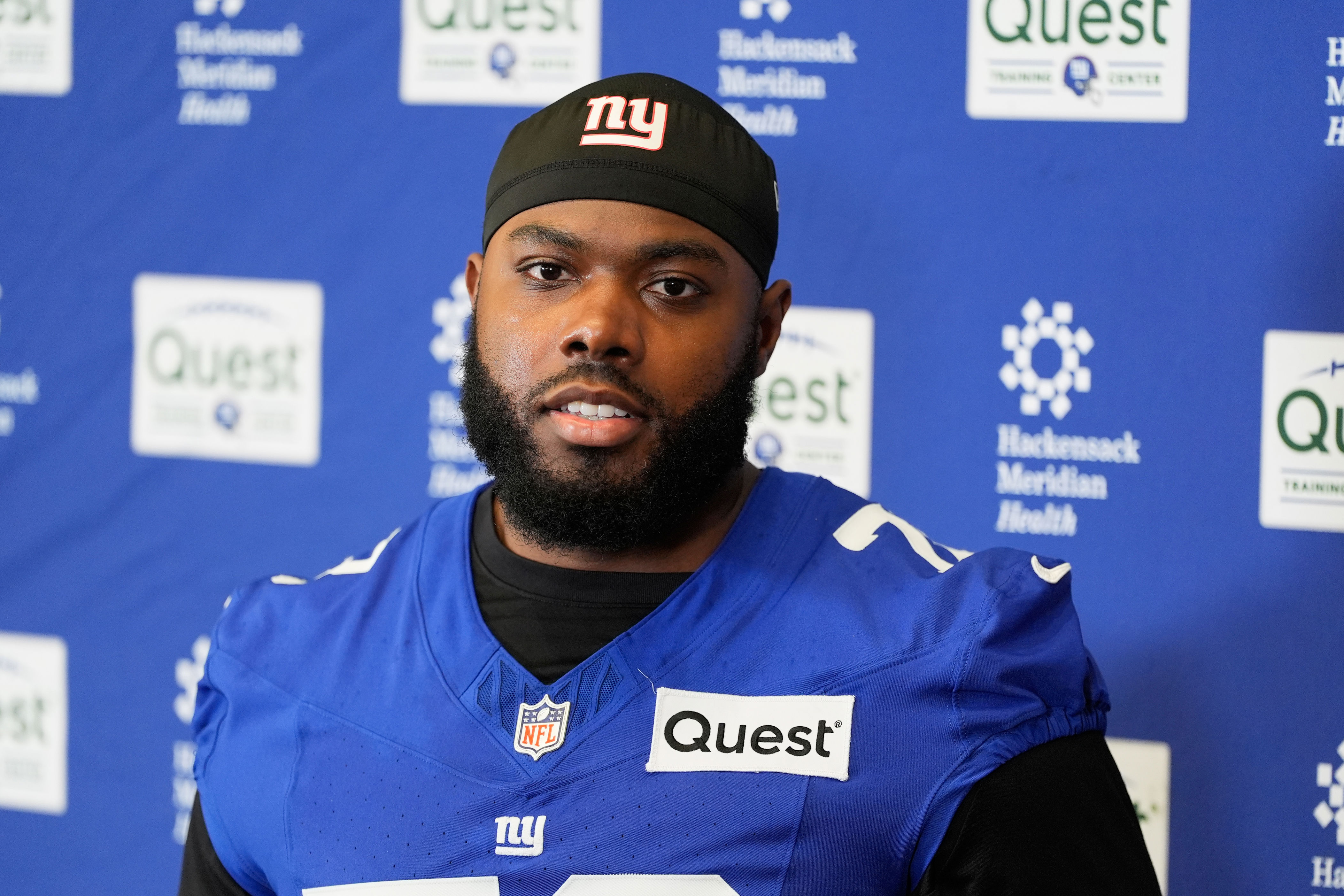 Giants restructure left tackle Andrew Thomas' contract to clear cap ...