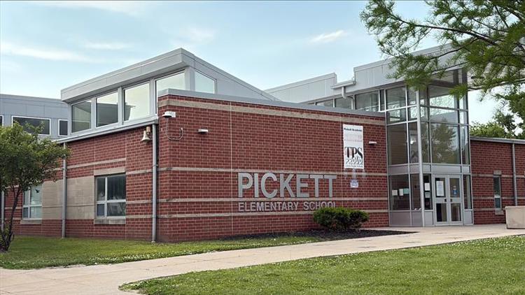 Police: Attack on child led to Pickett Academy graduation fight