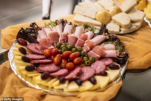 Ex-JPMorgan banker wins $4M after being axed over a deli platter