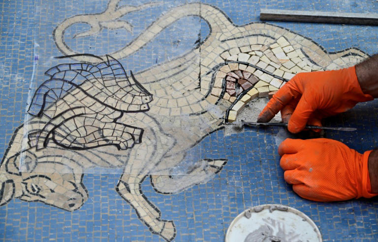Milan restores bull mosaic's testicles to former glory