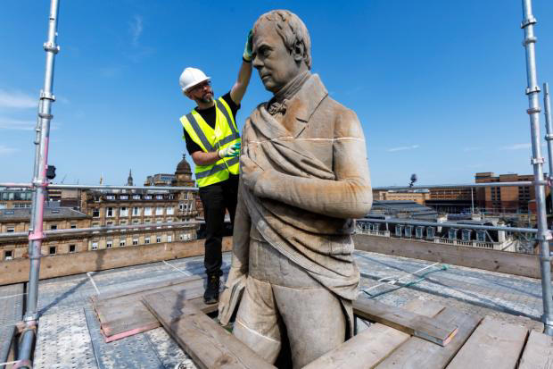 Work shown on historic Sir Walter Scott Monument as scaffolding to be ...