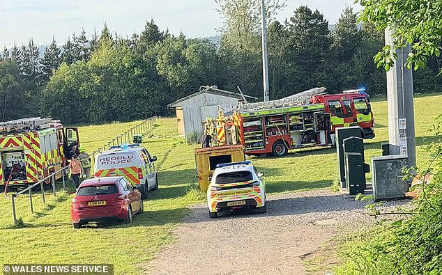 Boy, 11, is rushed to hospital after being trapped in burning storage ...