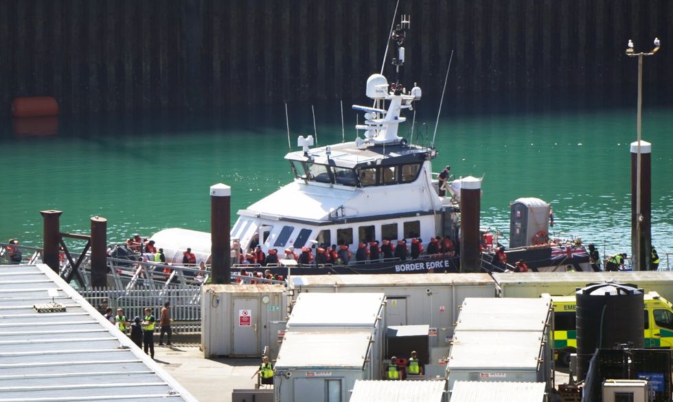 Three small boat pilots face prison as 1000s of migrants cross Channel ...