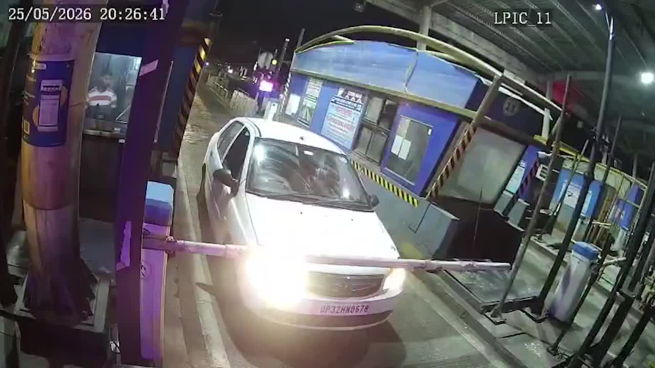 Out-of-control truck crashes through car waiting at toll gate
