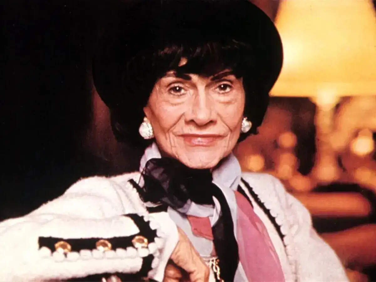 Quote of the day by Coco Chanel: 'Look for the woman in the dress. If ...