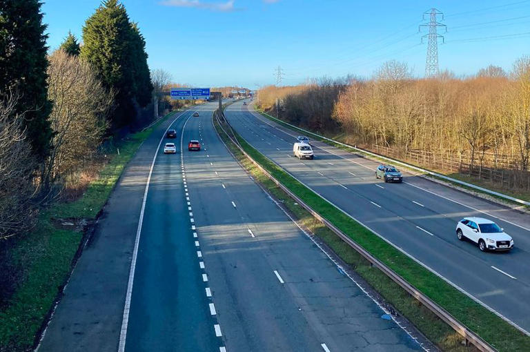 Woman seriously injured after falling from M53 bridge