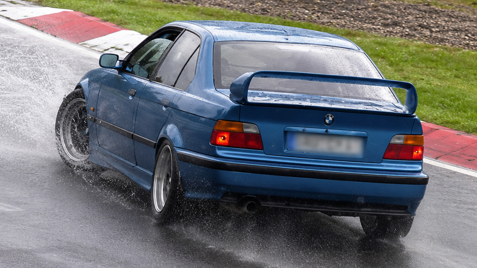 High speed Nürburgring slide creates intense rain racing chaos instantly