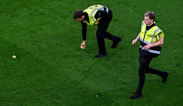 Ireland match forced to stop as tennis balls thrown onto the pitch in ...