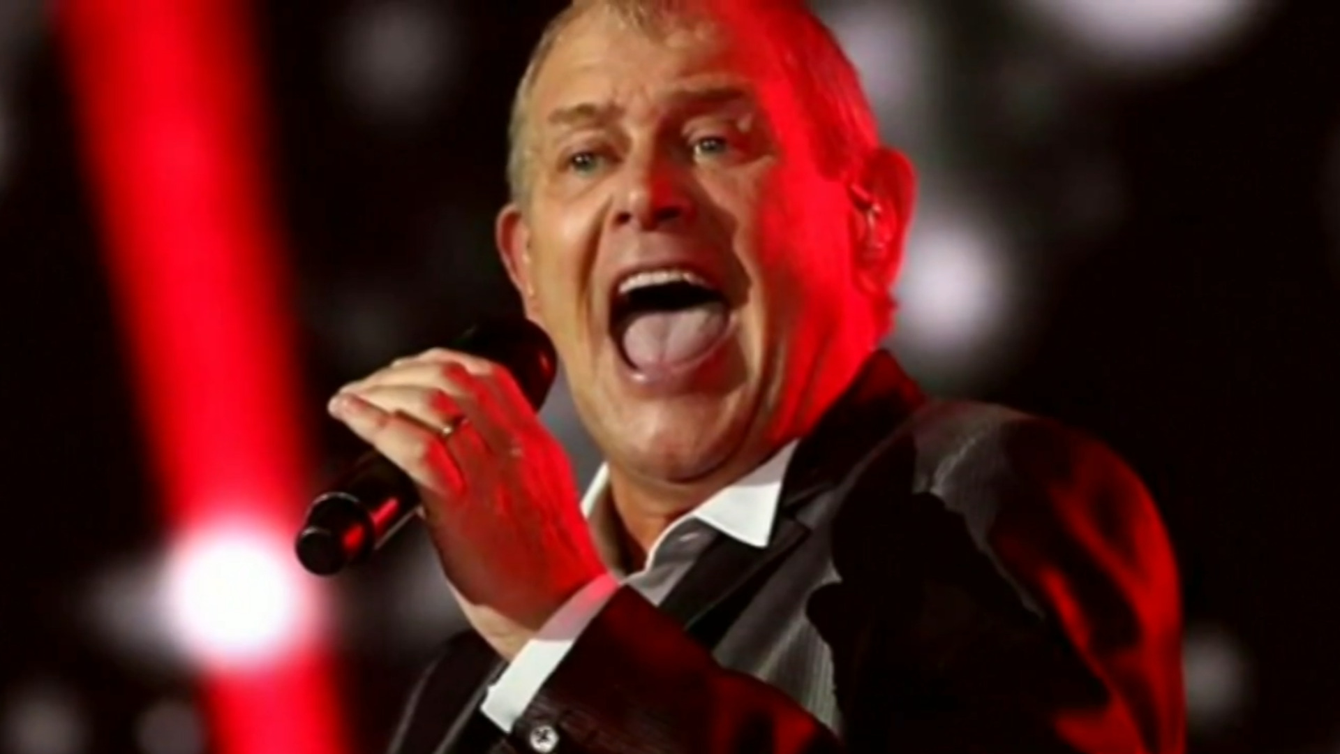 John Farnham reveals he will never sing in public again