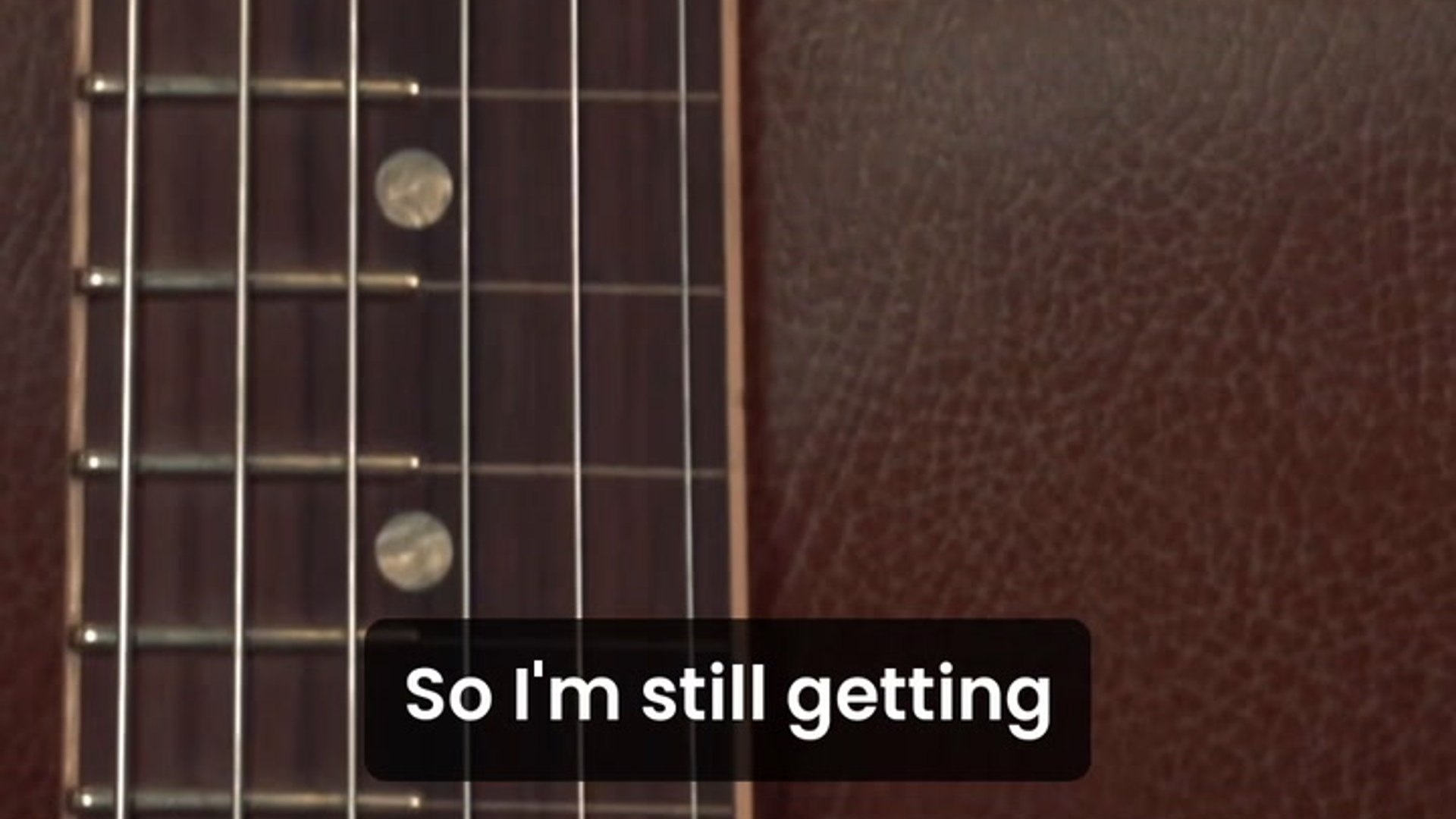 Dweezil Zappa demonstrates his unique semi-fretless guitar