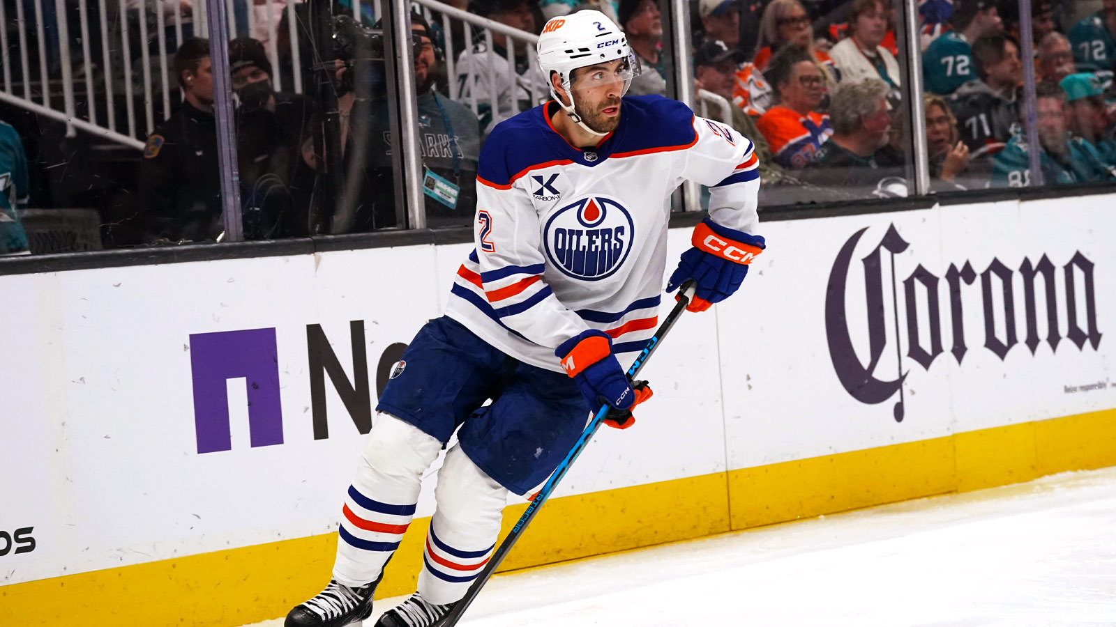 Oilers’ Evan Bouchard knocked out cold by Ryan Lindgren hit at World ...
