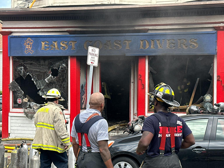 Worker burned during fire, explosions at Brookline dive shop
