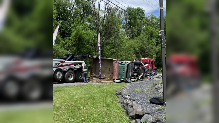 Dump truck overturns in Route 209 crash near Snydersville