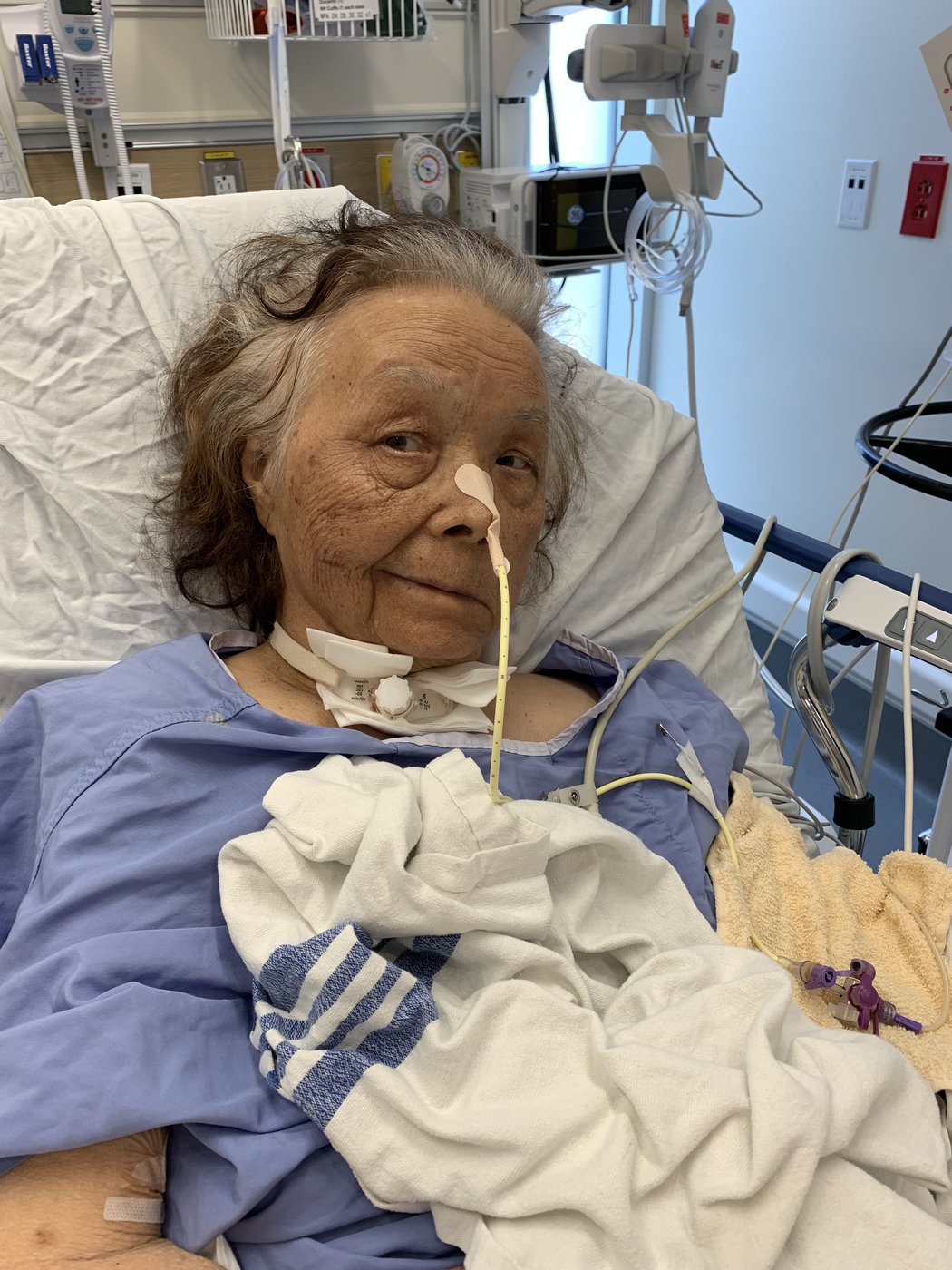 BC woman returns home after 2 months in induced coma in China