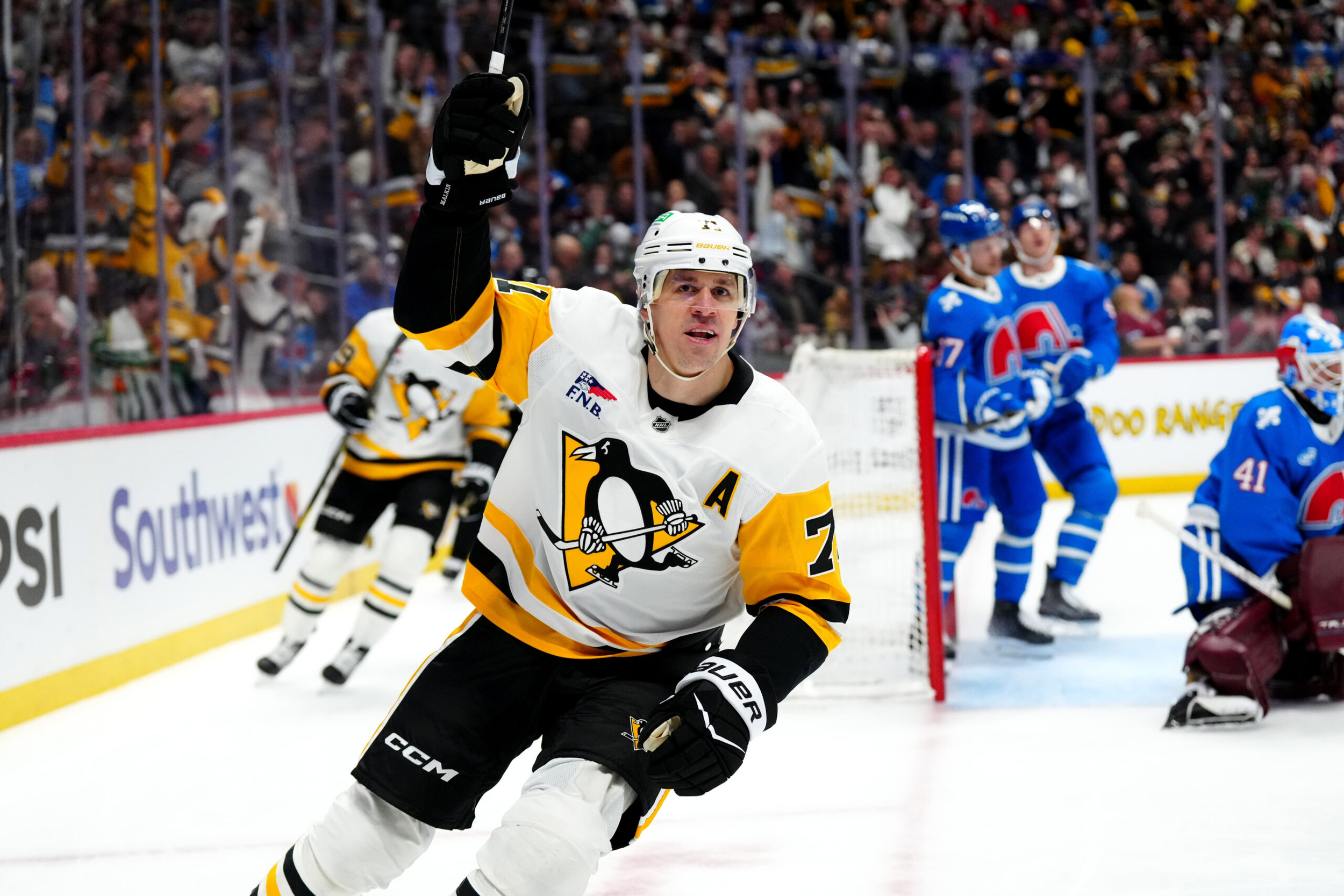 NHL notebook: Malkin re-signs with Penguins, Bouchard injured after big ...