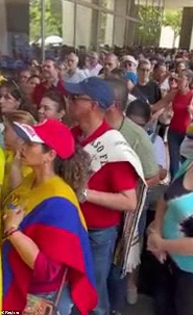 Massive line forms in Houston to vote in presidential election of ...