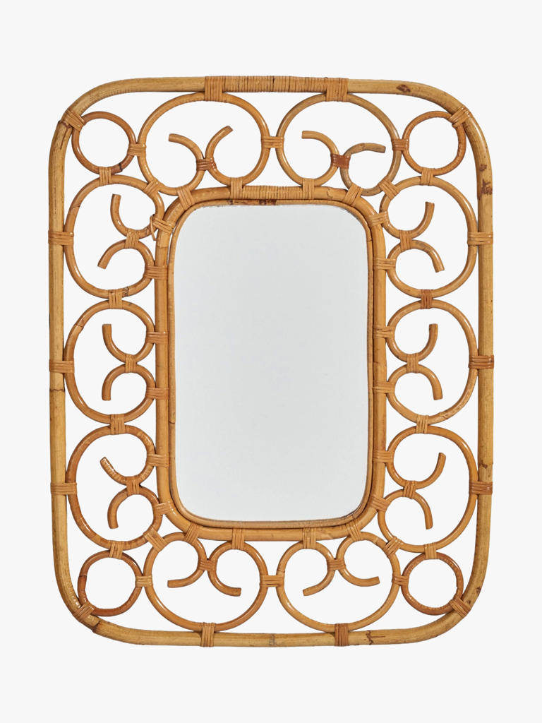 This Loopy Rattan Mirror Stars in Several AD Home Tours