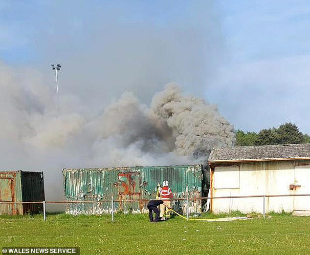 Boy, 11, is rushed to hospital after being trapped in burning storage ...