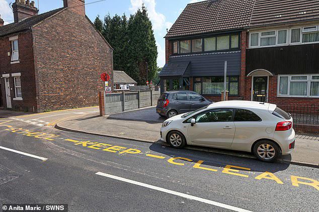 Cash-strapped council covers 'School Keep Clear' sign where no school ...