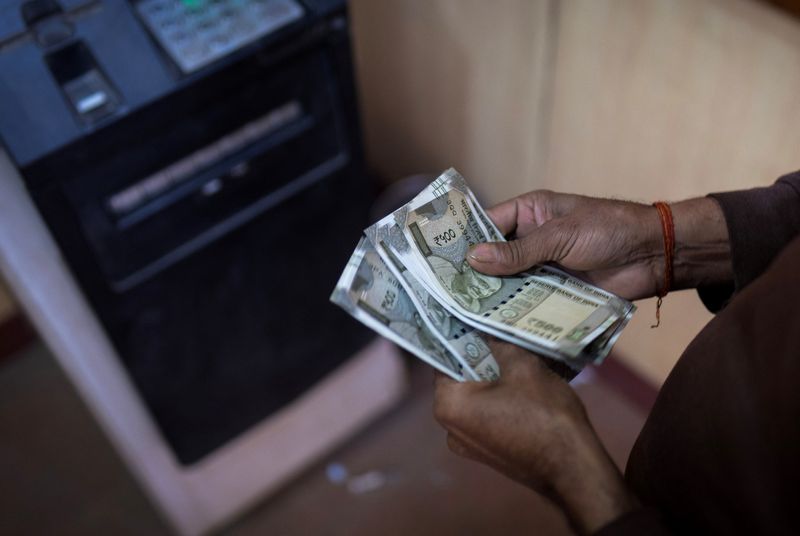 Rupee soars to best day in nearly two months as central bank steps in ...