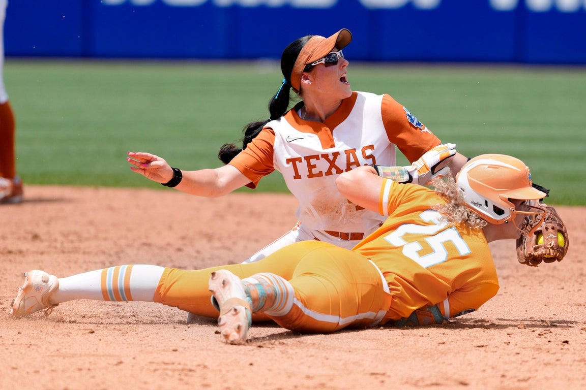 Electric photos capture the intensity of the Women’s College World Series