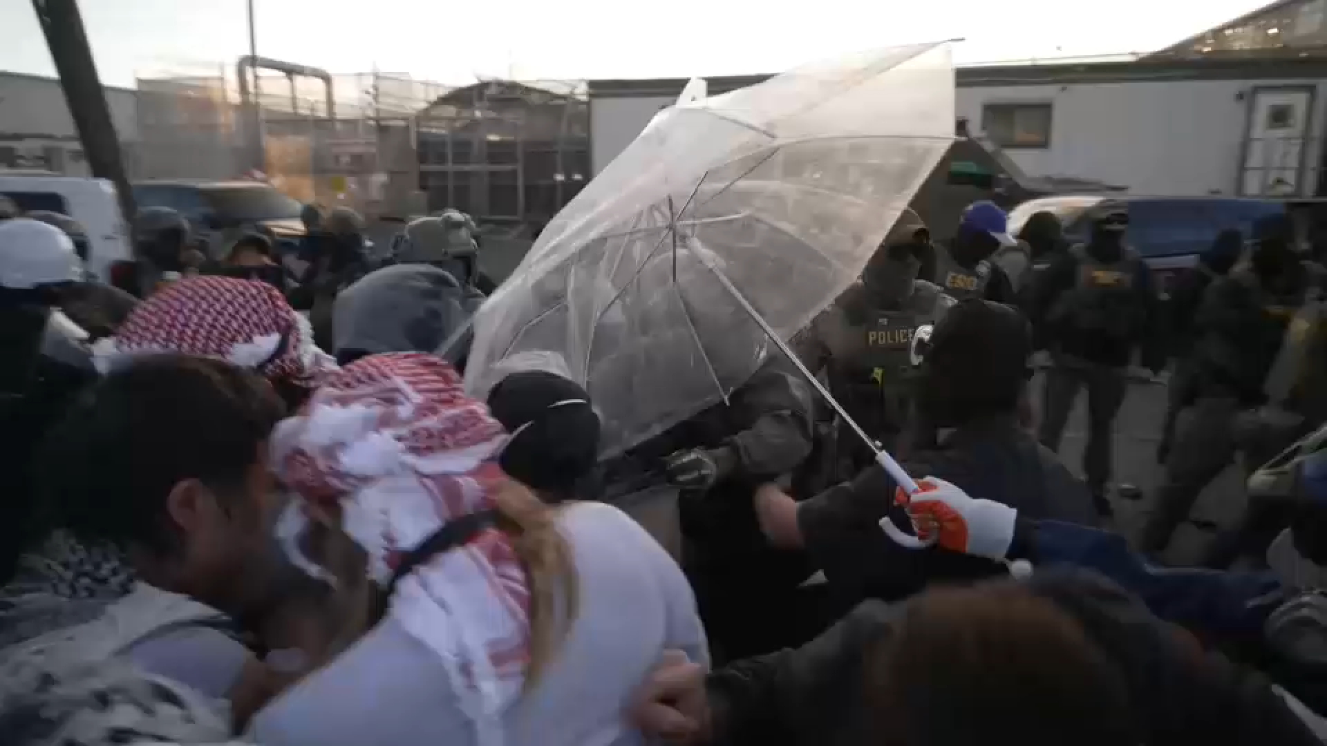 Protesters shoved, pepper sprayed during clash with ICE agents outside ...